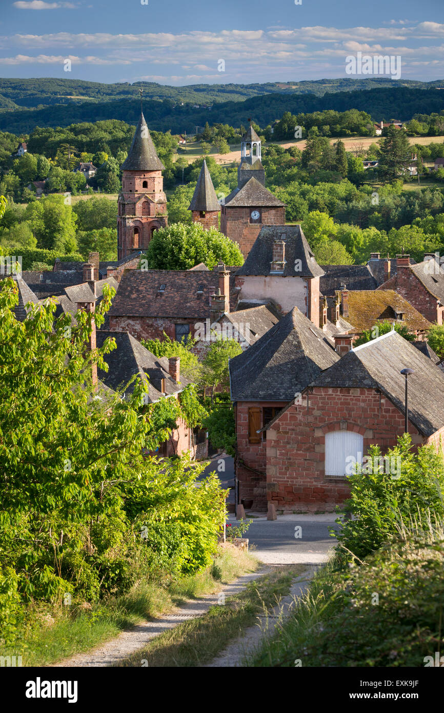 Evening sunlight over medieval town of Collonges-la-Rouge, in the ...