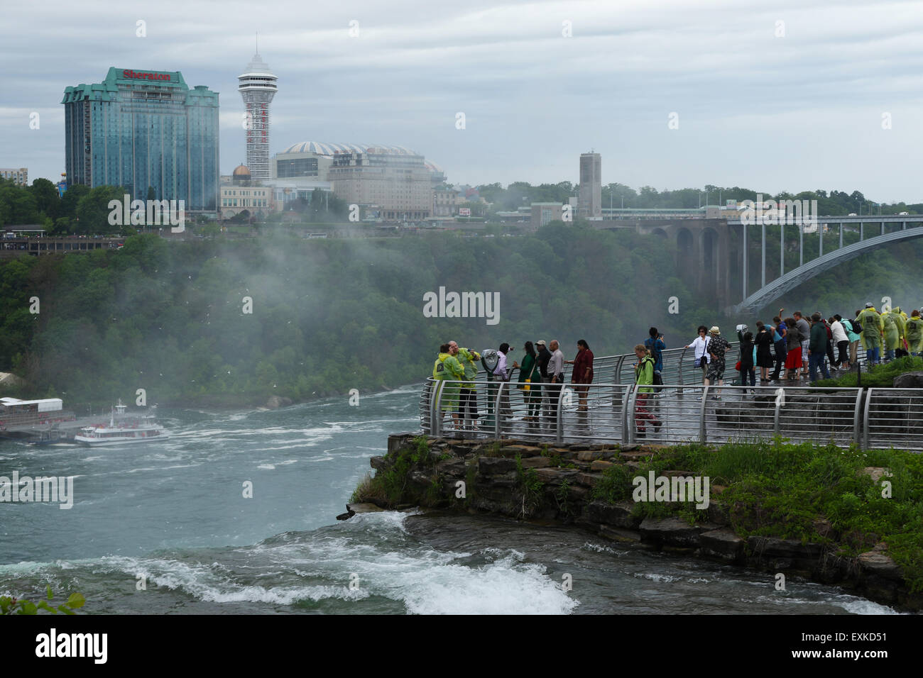 Tourists on Luna Island are looking at the American Falls. Bridal Veil ...