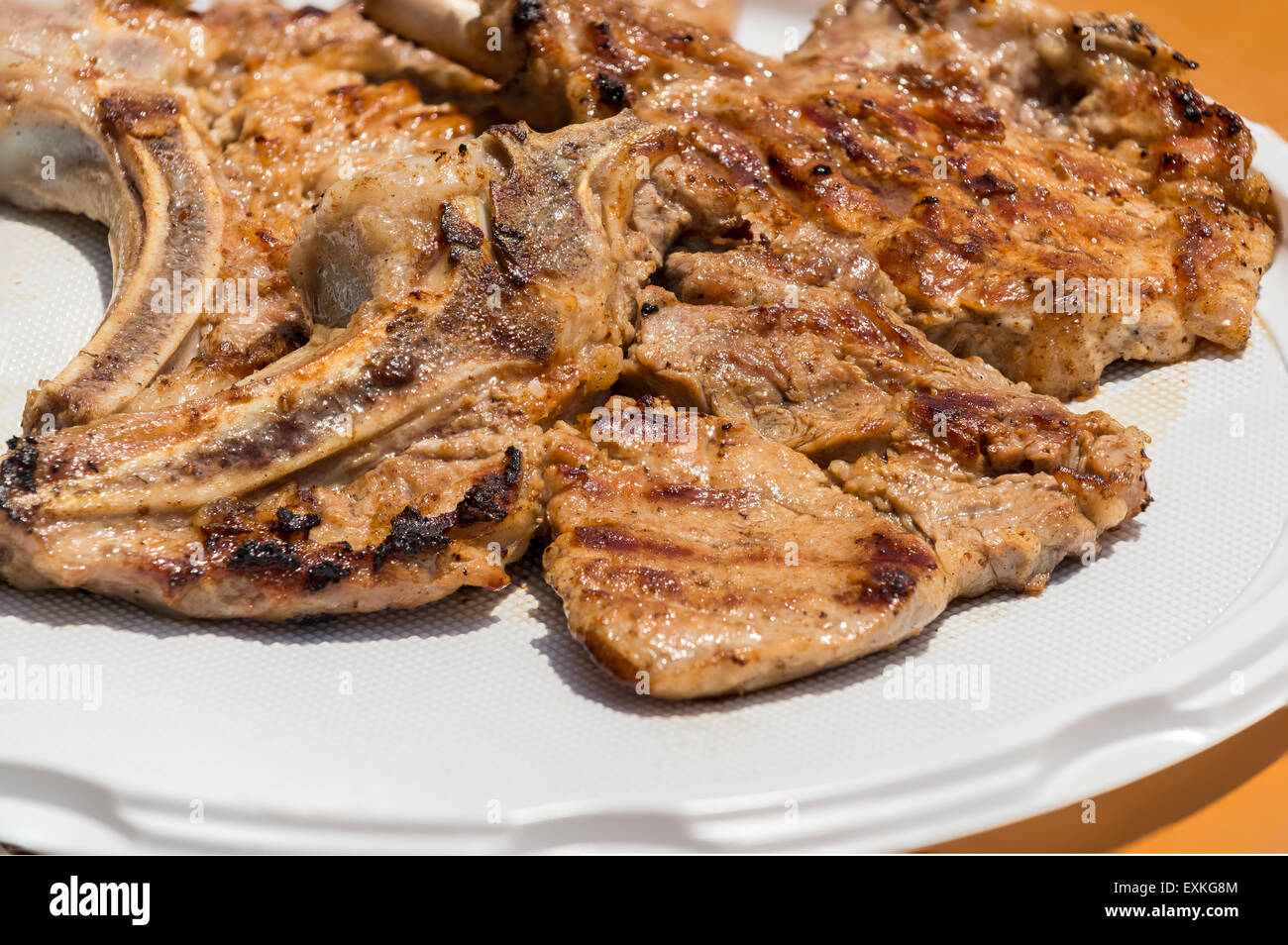 In the picture a veal cutlet just cooked on the barbecue Stock Photo ...