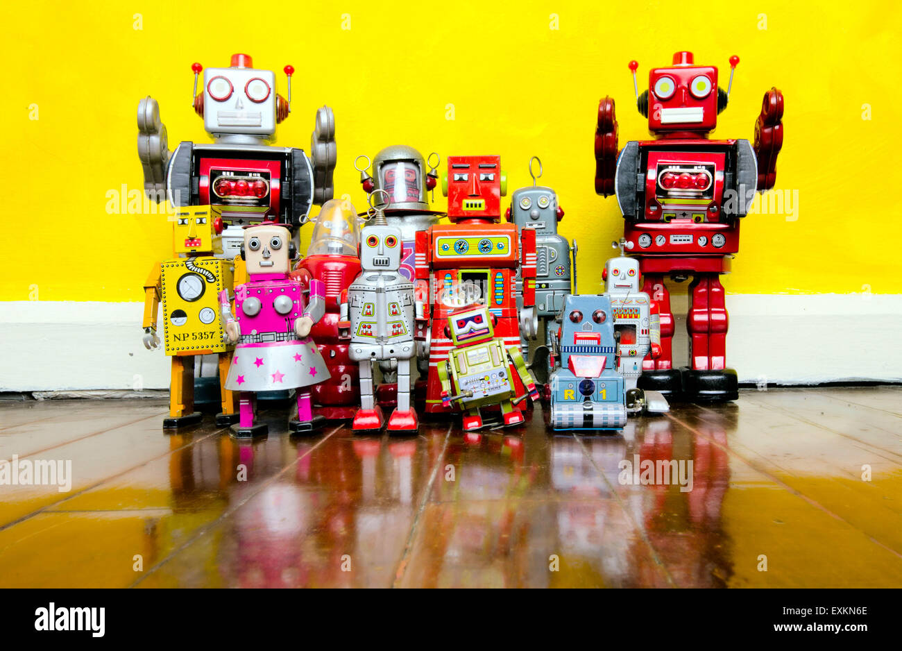 retro robot toys on a wooden floor Stock Photo - Alamy