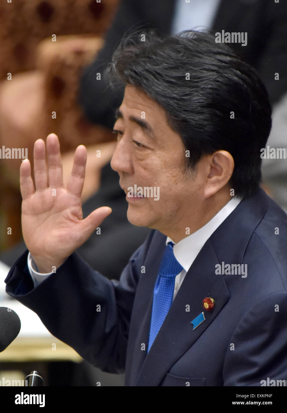 Tokyo, Japan. 15th July, 2015. Japans Prime Minister Shinzo Abe answers ...
