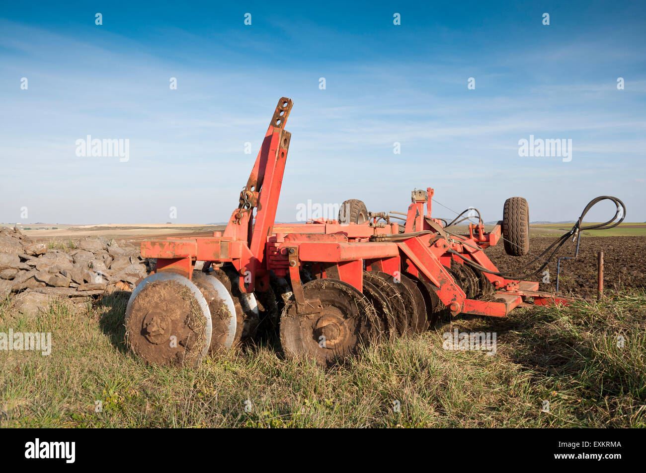 Plow ripper in the field Stock Photo - Alamy
