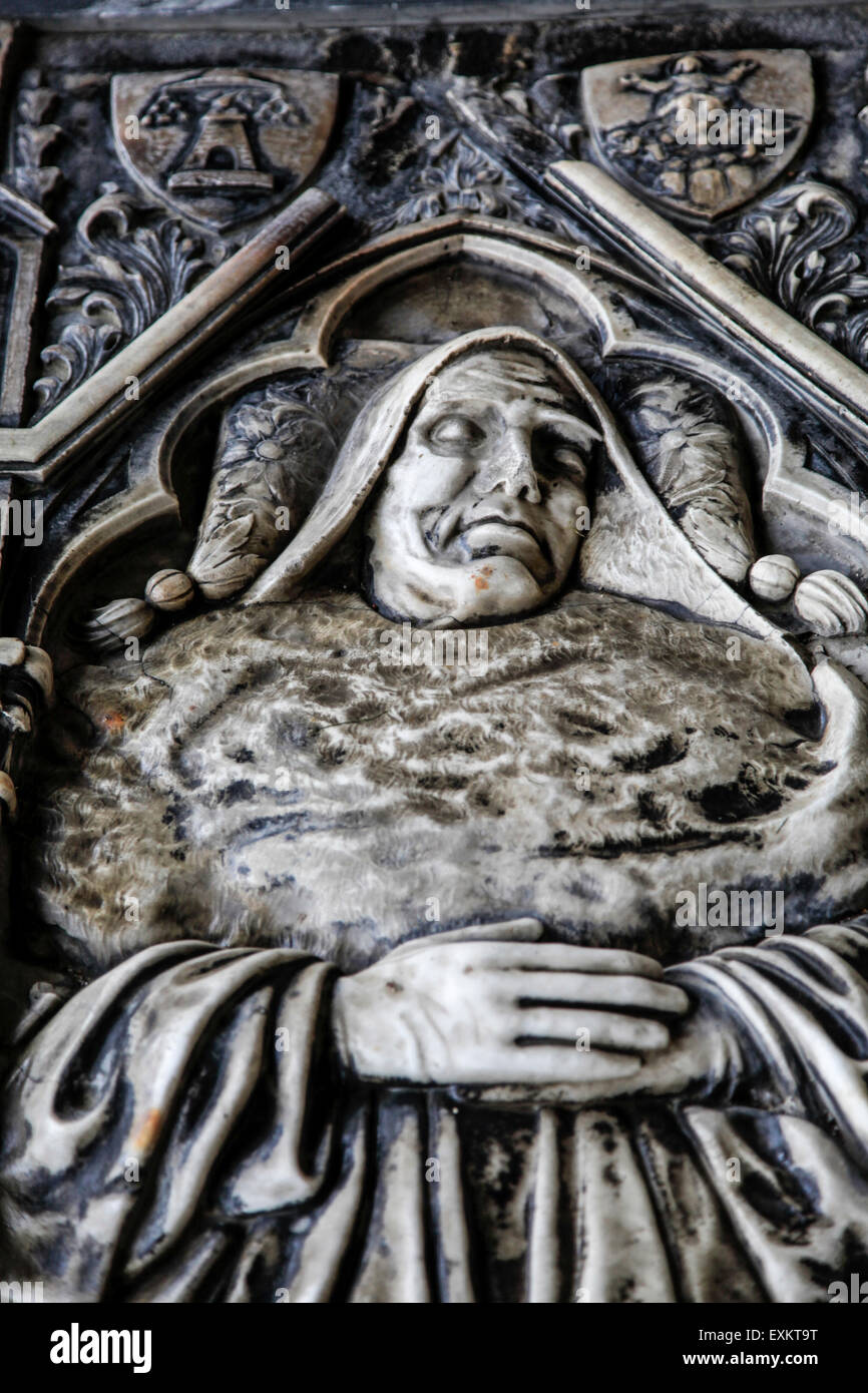 carved stone relief on a slab inside the Camposanto Monumentale ...
