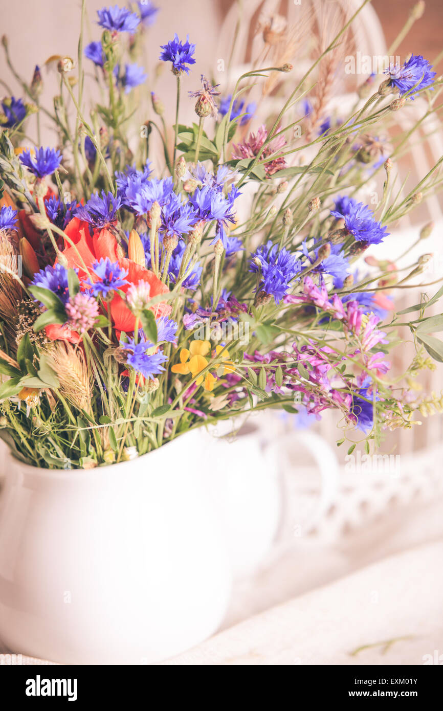 Wildflowers in jug Stock Photo - Alamy