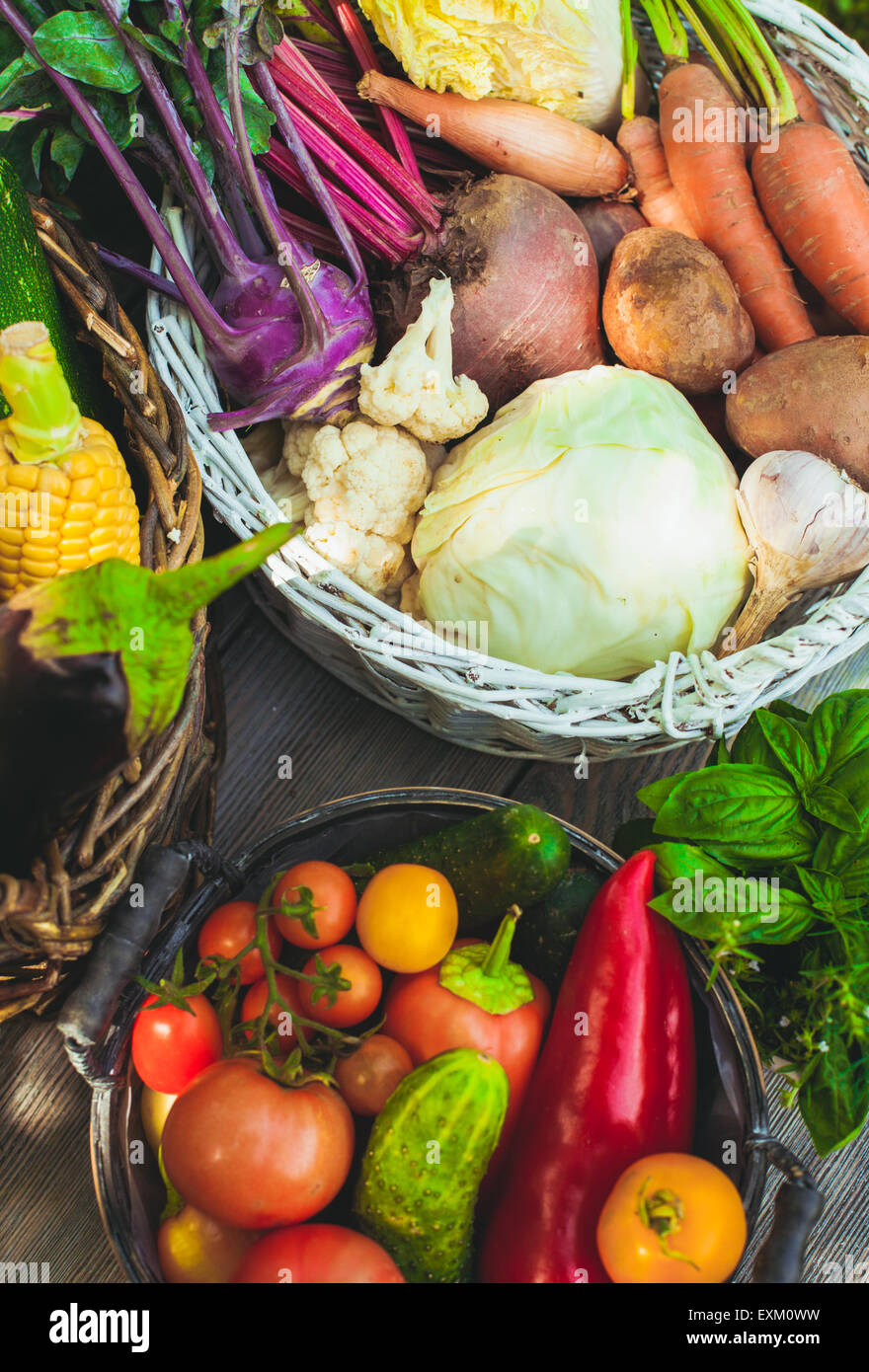 Vegetables on wooden table Stock Photo - Alamy