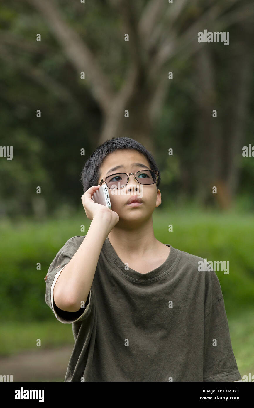 Asian teen boy talking hi-res stock photography and images - Alamy