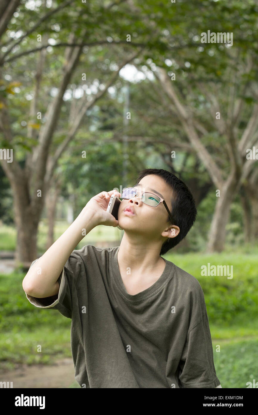 Asian teen boy talking hi-res stock photography and images - Alamy