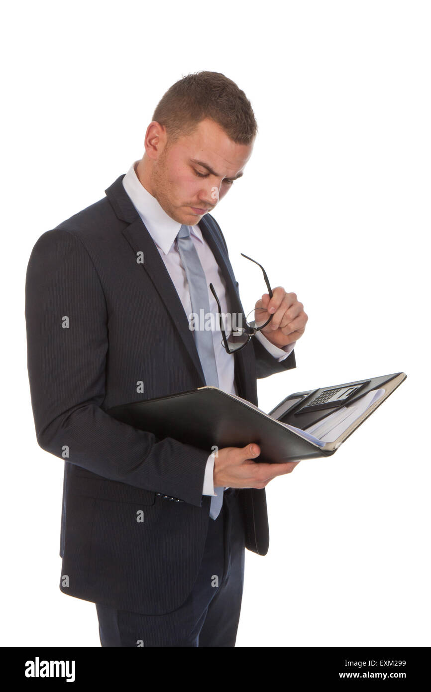 Busy business man reading some documents Stock Photo - Alamy