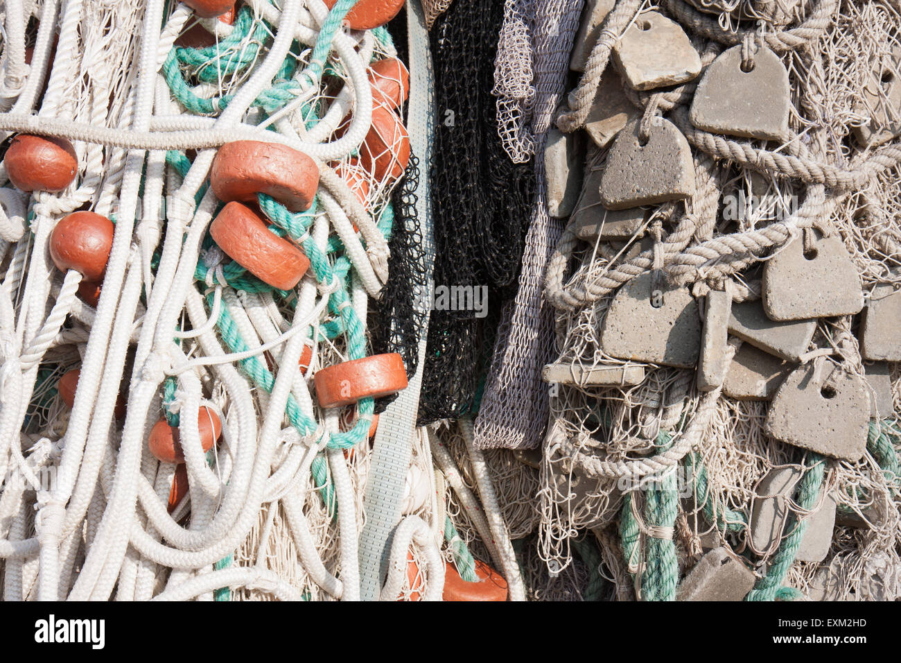 Pile of fishing net with floats Stock Photo - Alamy