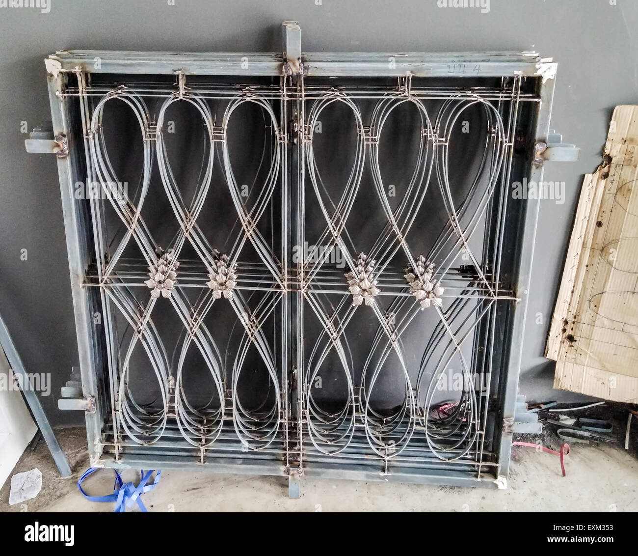 Unfinished curved steel for the window of modern house Stock Photo - Alamy