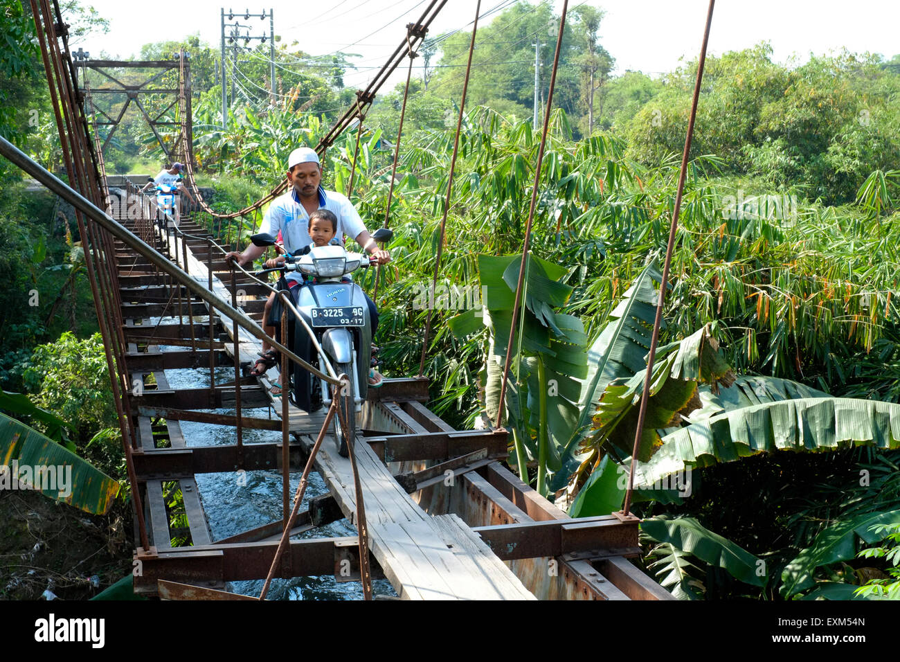 dangerous unstable bridge over ravine not designed for people is used ...