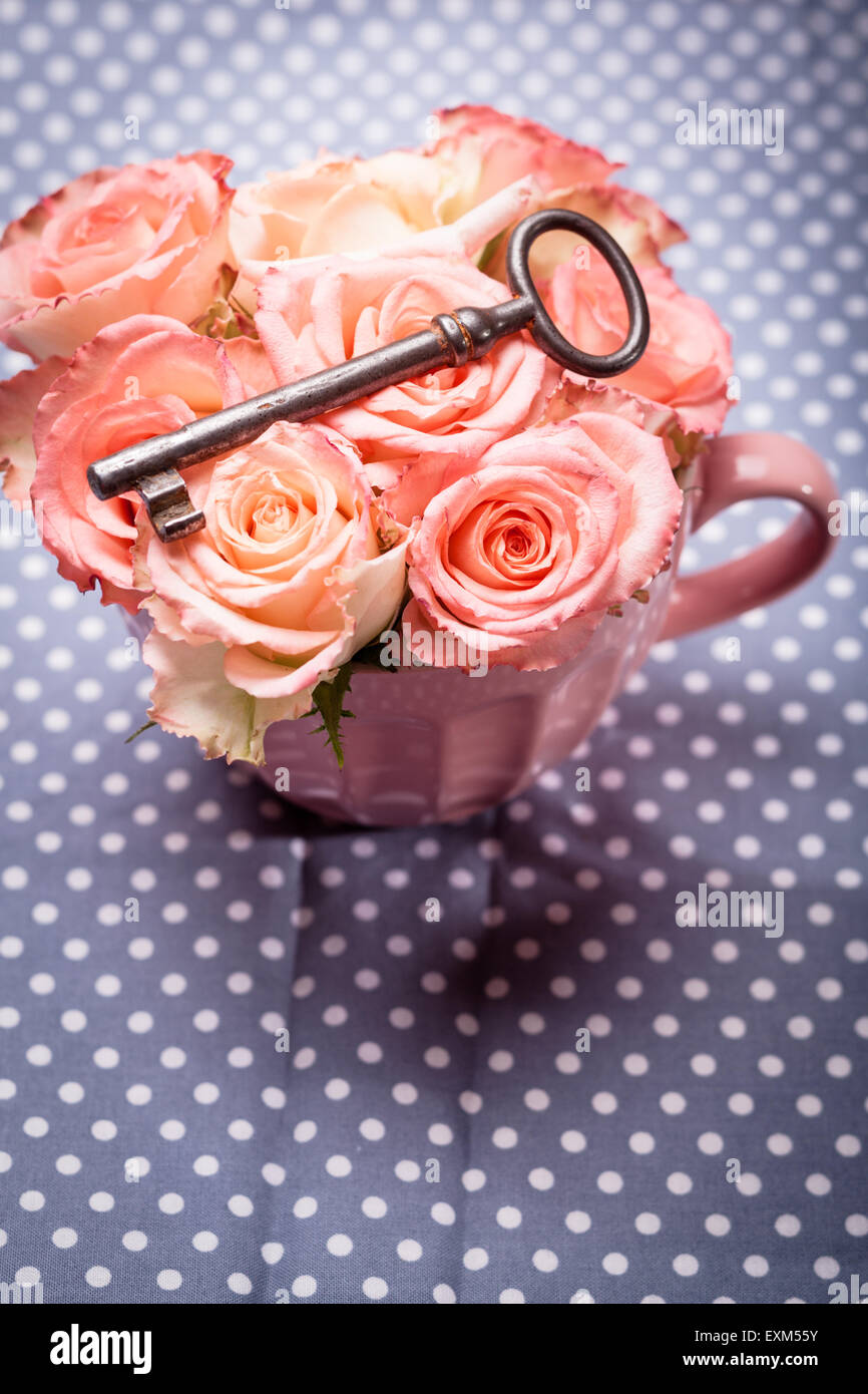 Old key and roses Stock Photo - Alamy