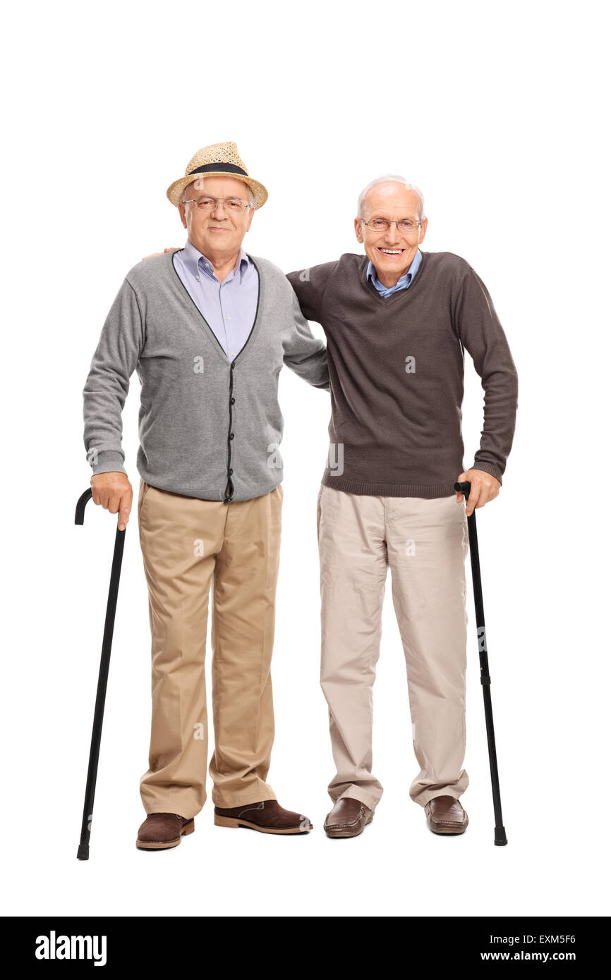 Full length portrait of two old friends posing together isolated on ...