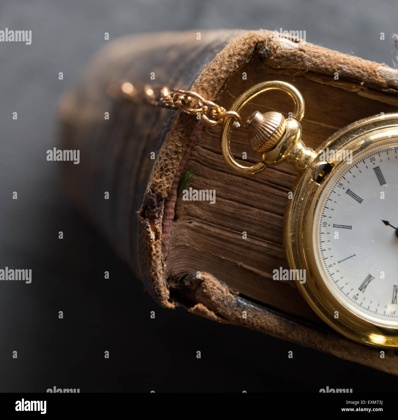 Vintage pocket watch old book, symbols of time Stock Photo - Alamy