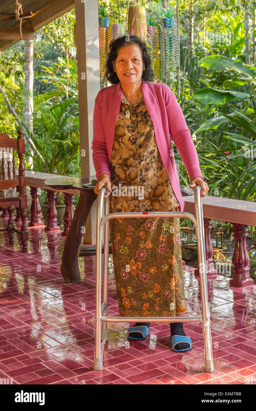 Asian Thai senior disabled woman with walker Stock Photo - Alamy