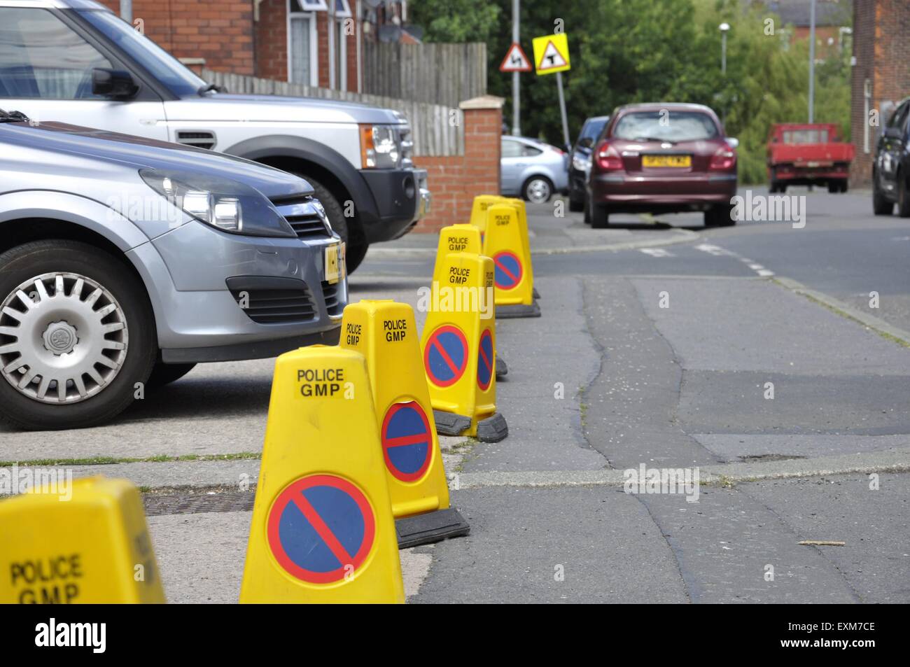 A row of Greater Manchester Police cones placed on the pavement Stock ...