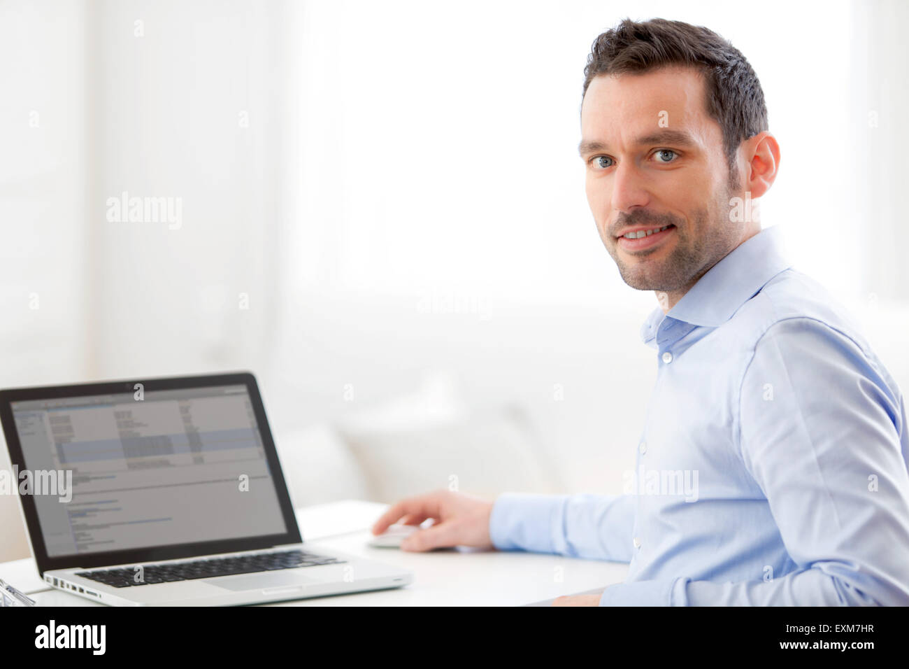 Serious handsome man working laptop hi-res stock photography and images ...