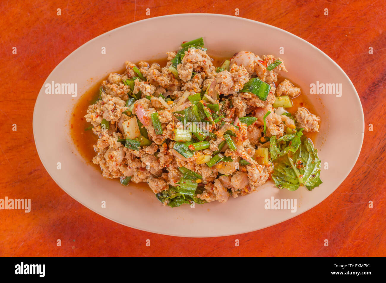 Minced duck spicy salad with herbs, Thai food Stock Photo - Alamy
