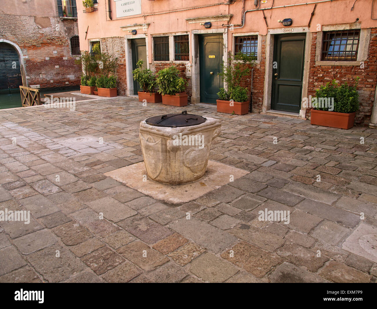Venice typical well built to collect rain water. Venice. Italy Stock ...