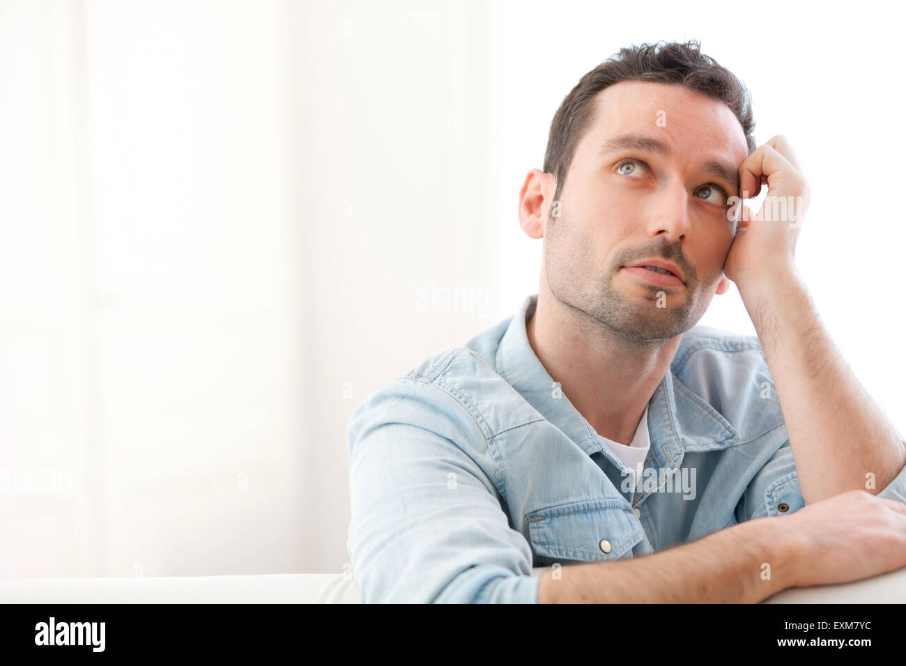 View of a young relaxed man Stock Photo - Alamy