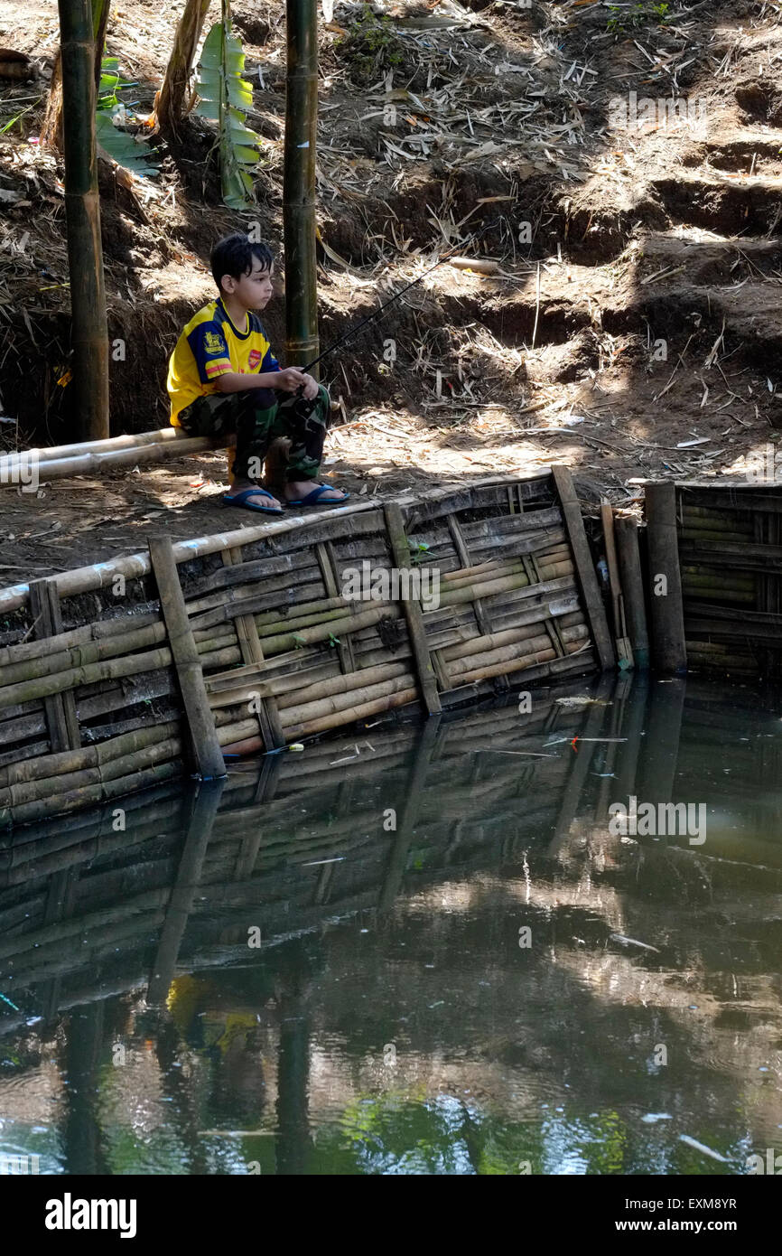 fishing indonesian style at a popular rural village man made pool near ...