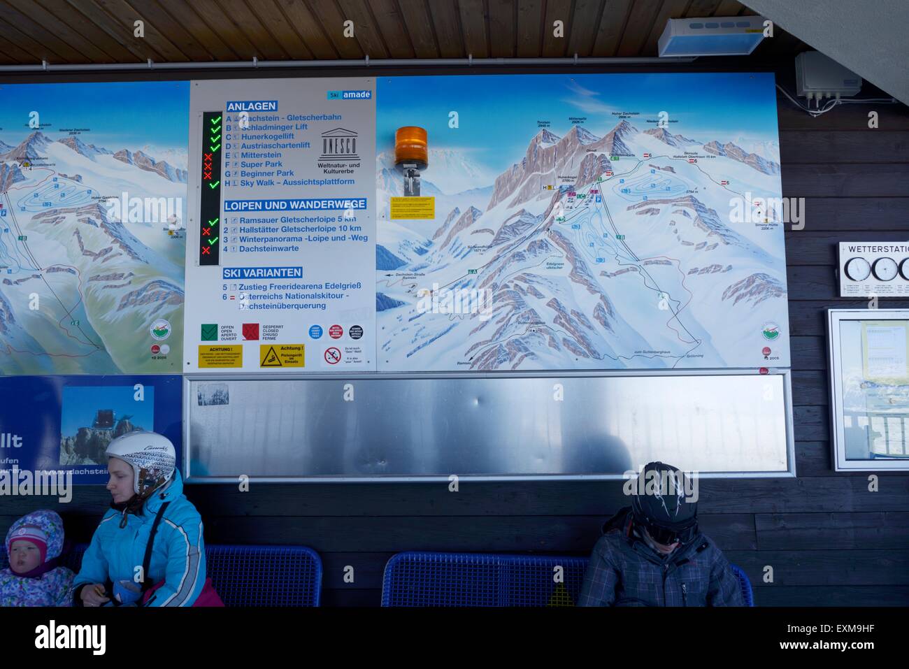 The Dachstein glacier- UNESCO World Natural Heritage, tourists sit in ...