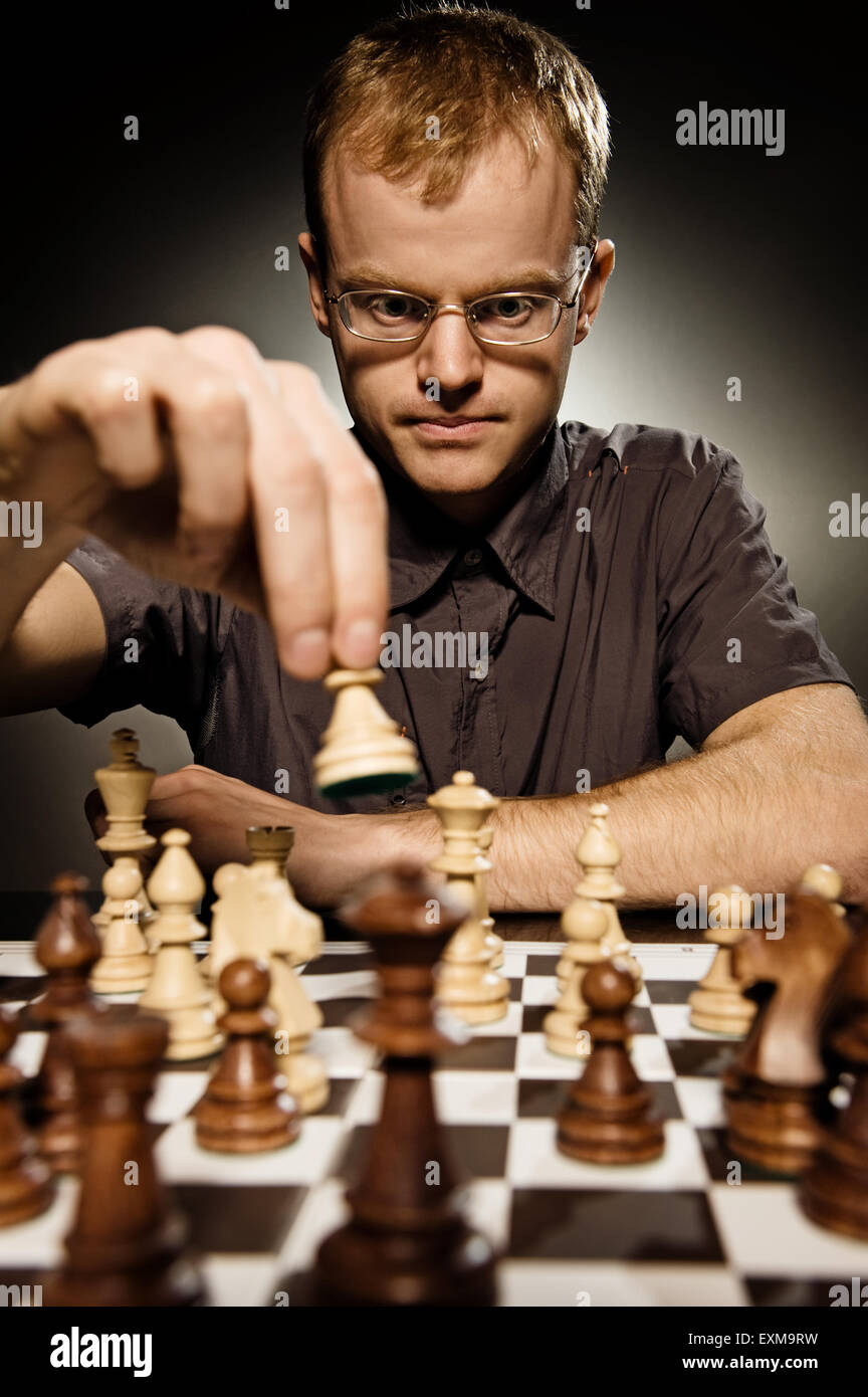 Chess master making smart move Stock Photo - Alamy