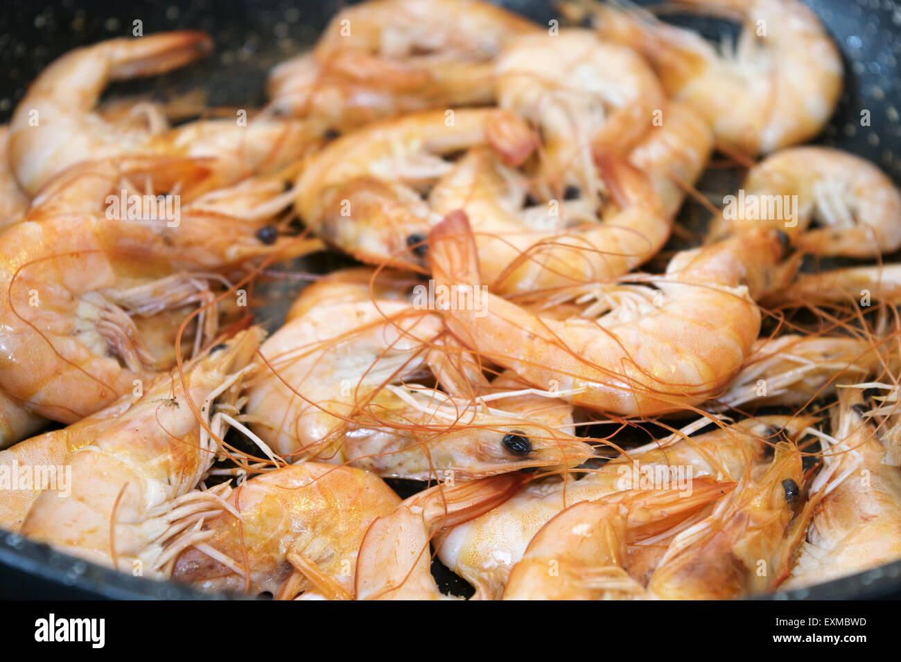 prawns of the mediterranean cooked in pan with white wine Stock Photo ...