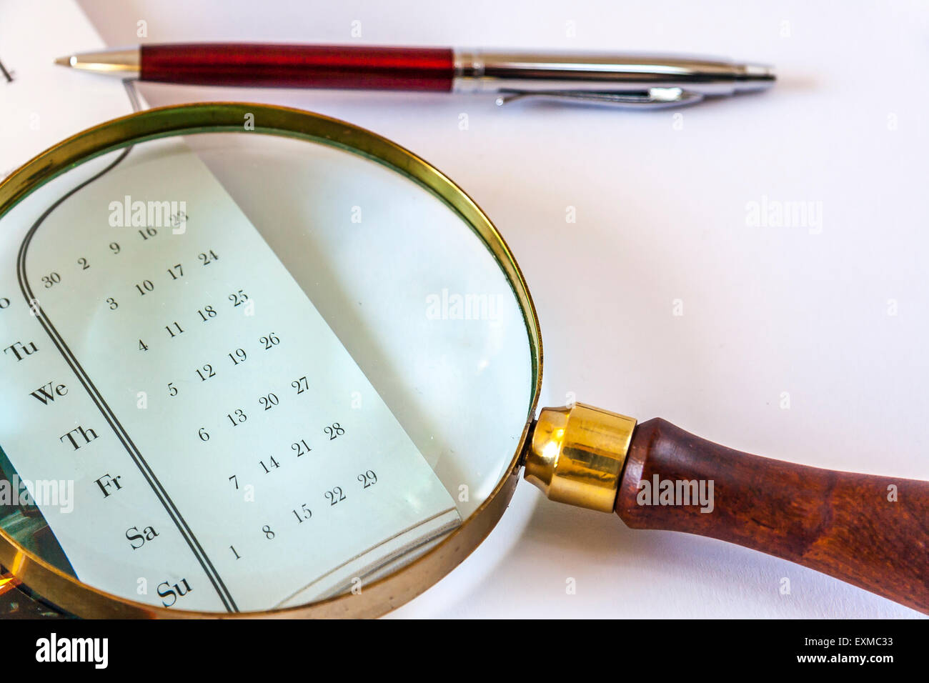 Magnifying calendar hi-res stock photography and images - Alamy