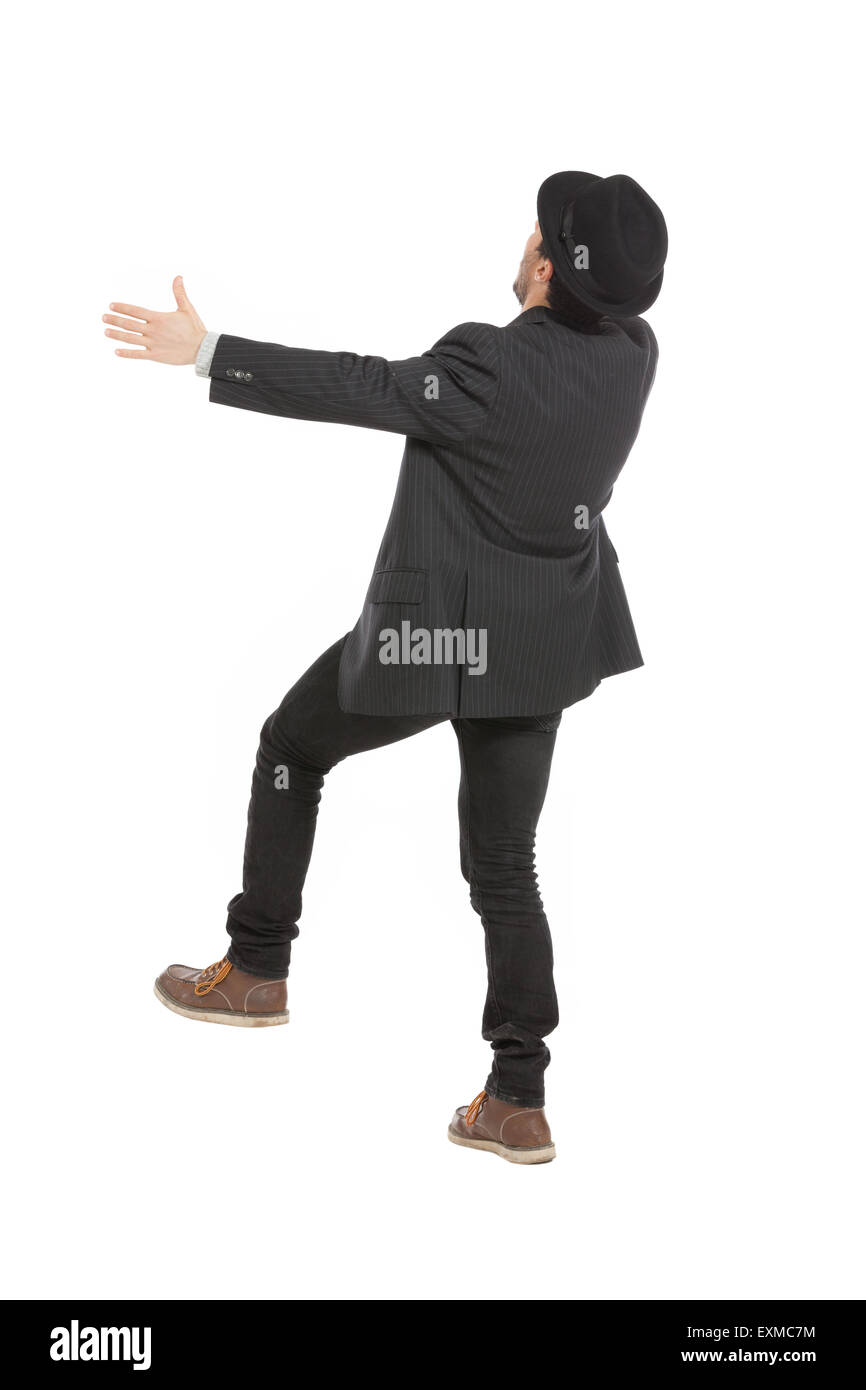 Young man with a hat isolated over white background Stock Photo - Alamy