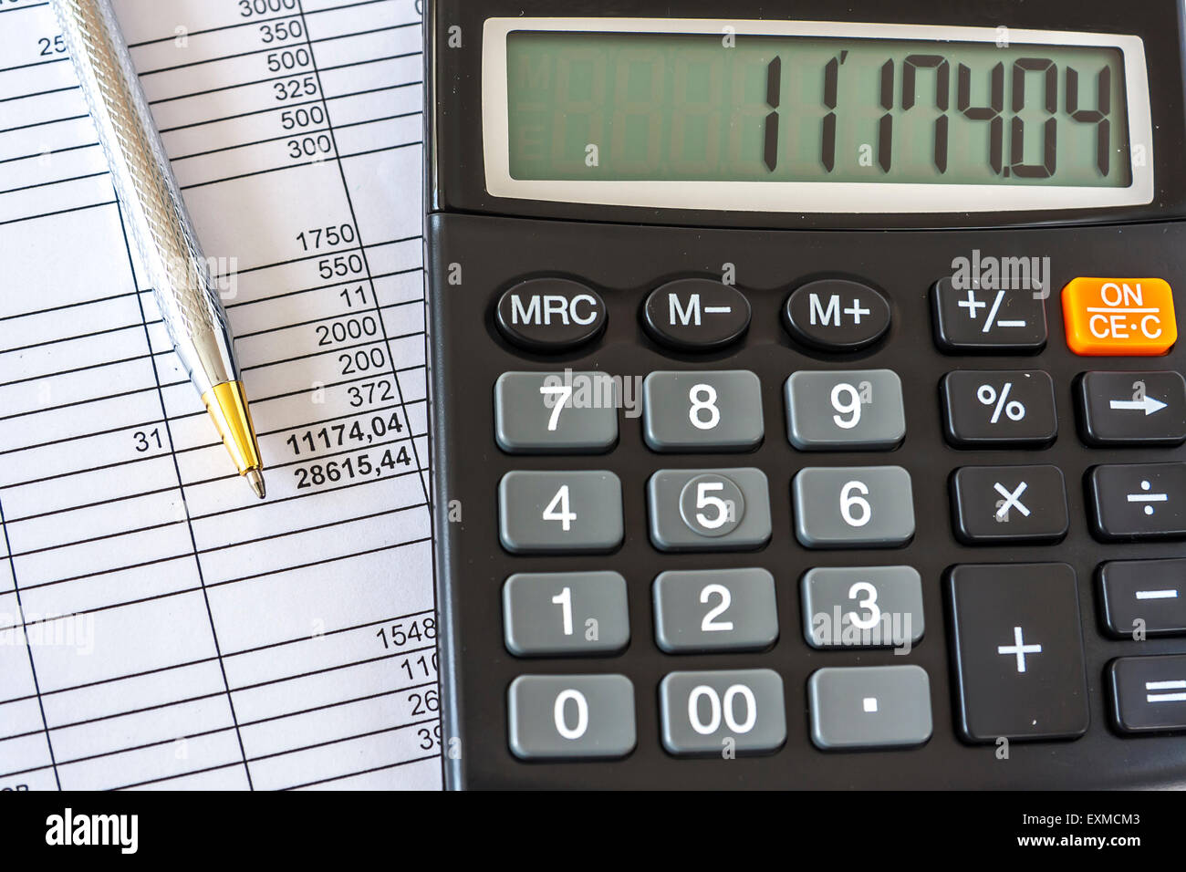 Business people working on calculator hi-res stock photography and ...