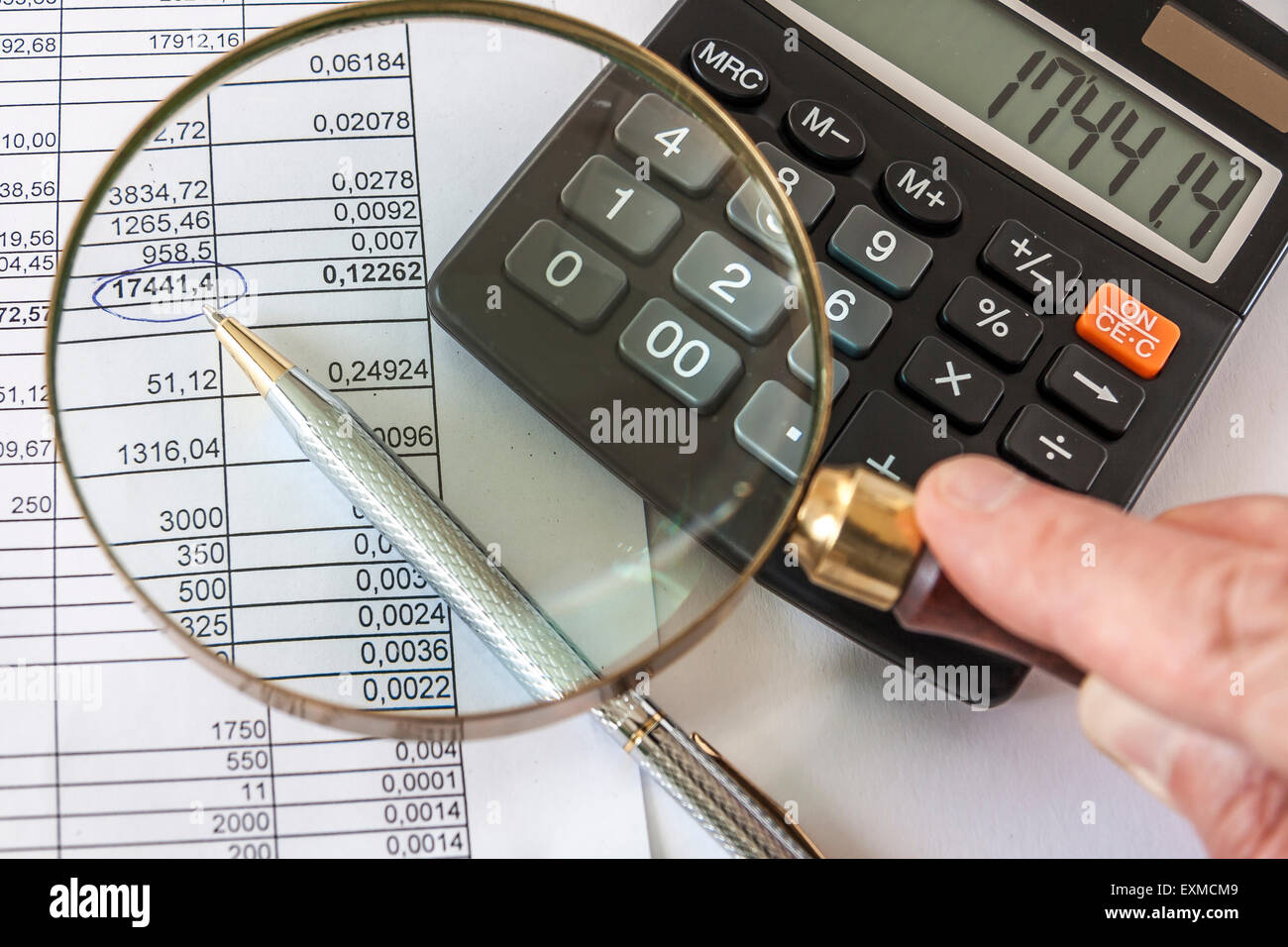 Hand Holding Magnifying Glass To Checking Business Document Stock Photo ...
