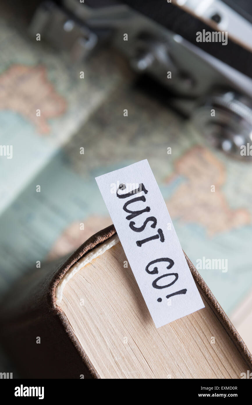 text "Just go" book and map. Travel and tourism concept. Just go text ...