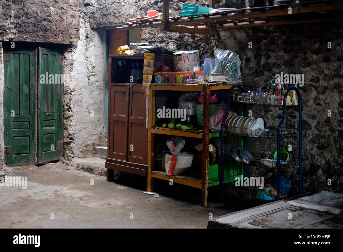 a sparse simple and basic kitchen in a house on mount lawu near solo ...