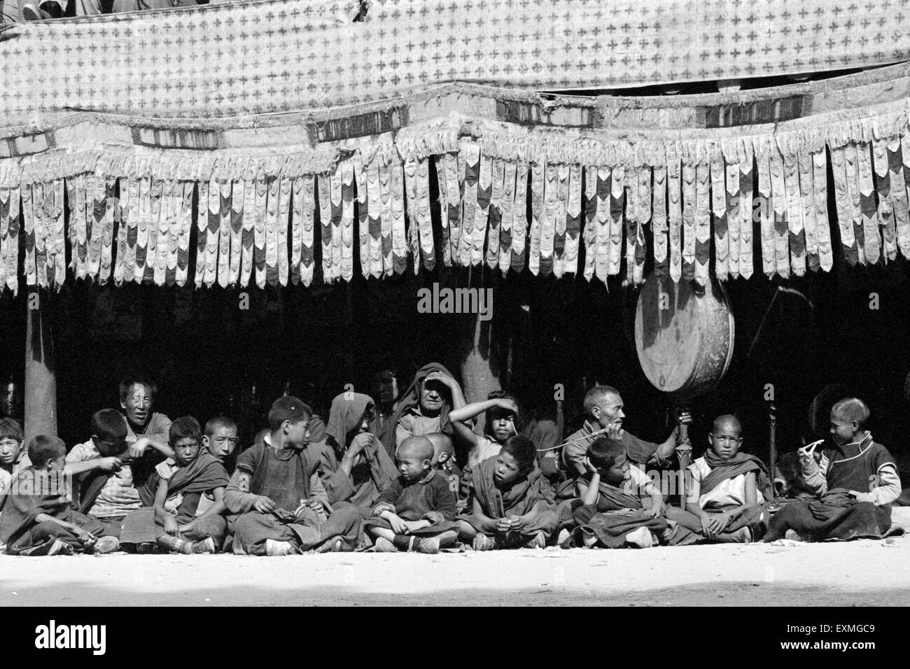 Buddhist monk playing musical instrument Tibetan drum, Hemis Festival ...
