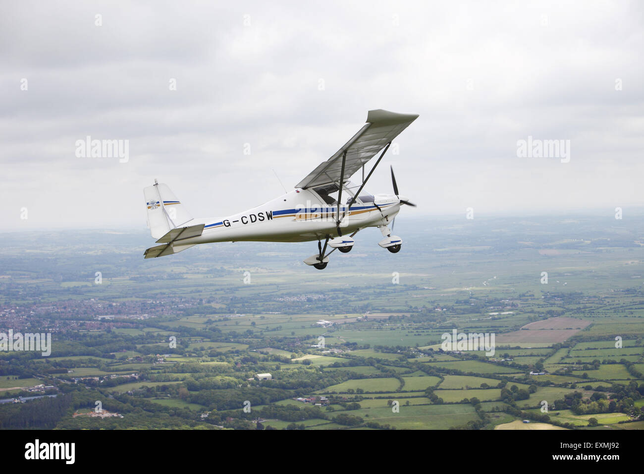 Aerial photograph of a microlight, a lightweight modern airplane, over ...