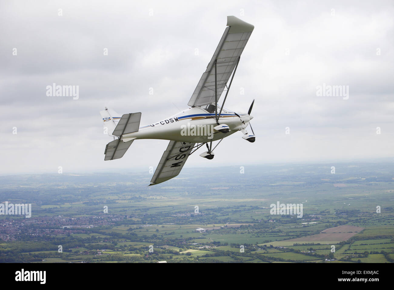 Aerial photograph of a microlight, a lightweight modern airplane, over ...