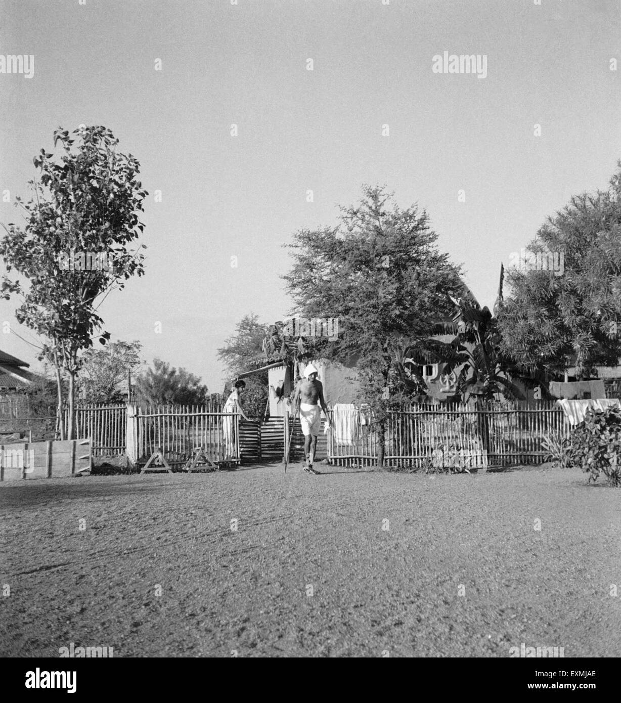 Mahatma Gandhi in front of his hut at Sevagram Ashram ; 1942 NO MR ...