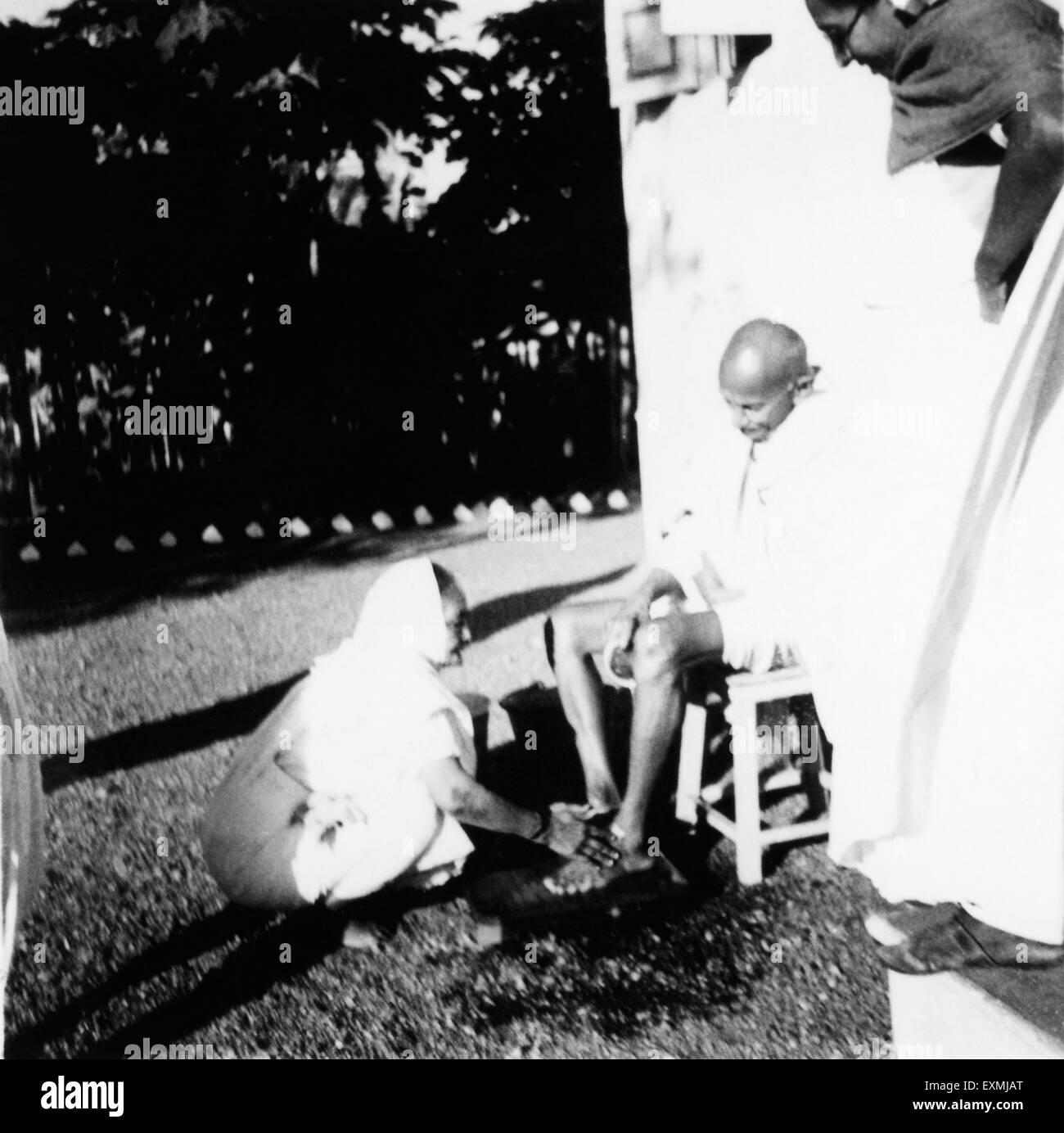 Kasturba Gandhi washing Mahatma Gandhi's feet at Bardoli ; 1939 ; India ...
