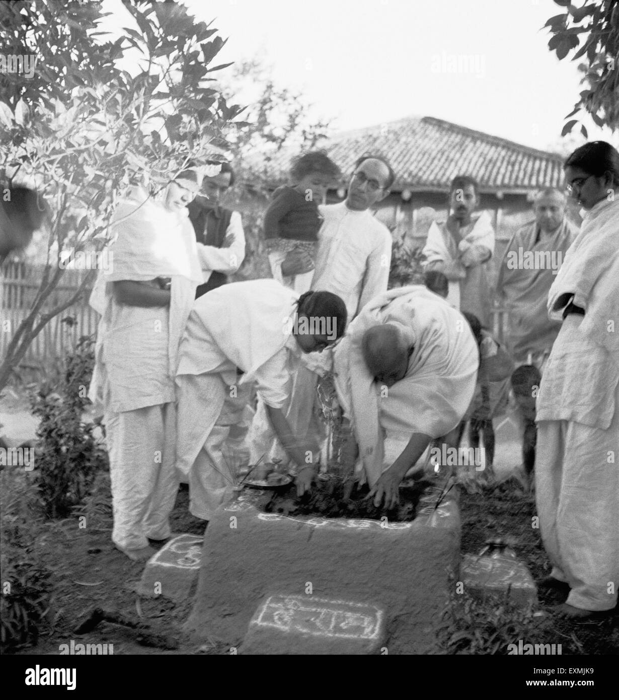 Mahatma Gandhi Abha Gandhi planting tulsi tree Sevagram Ashram August ...