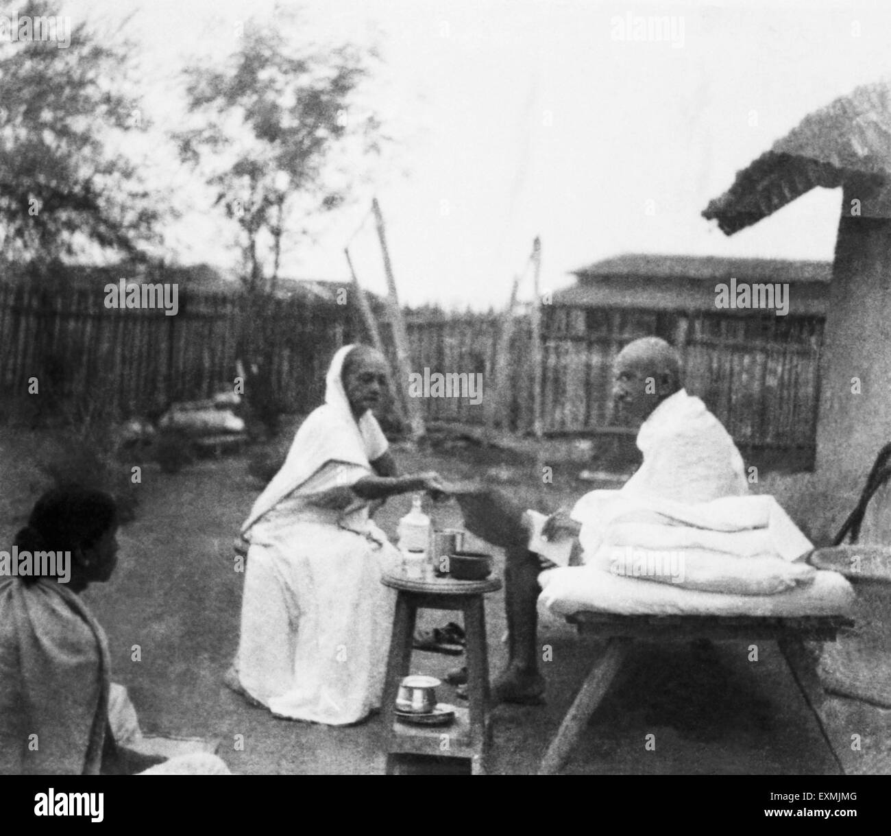 Kasturba Gandhi and Mahatma Gandhi having breakfast in front of Mahatma ...