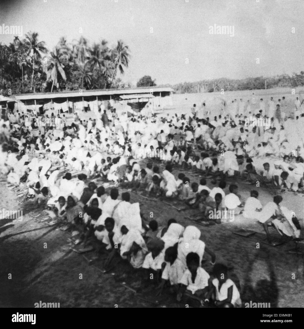 Harijans waiting for food ; Chandipur East Bengal ; 1947 ; India NO MR ...