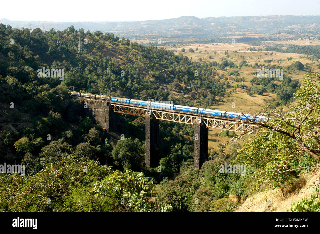 A Indian Railways train passes through the Kasara Ghat ; Maharashtra ...