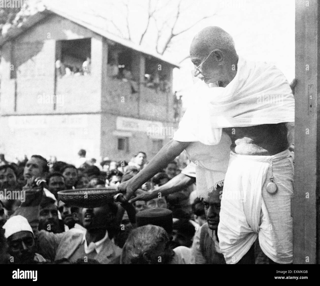 Mahatma Gandhi collecting donations for Harijan Fund with a basket in ...