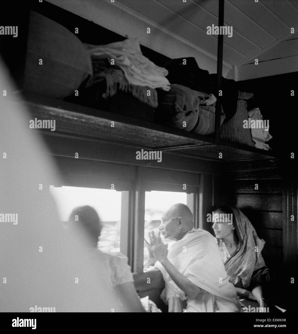 Mahatma Gandhi ; greeting people through the window of a train ; 1940 ...