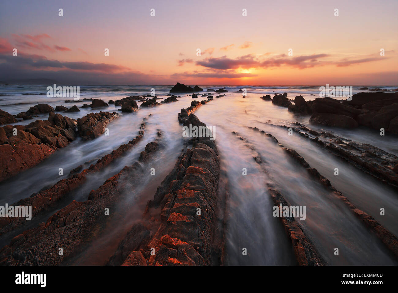 flysch rocks in barrika beach at the sunset Stock Photo - Alamy