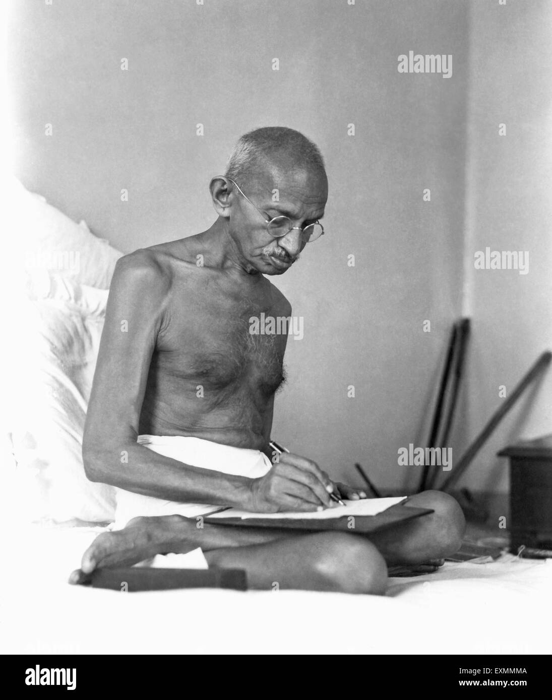 Mahatma Gandhi writing at Birla House ; Mumbai ; August 1942 ; India NO ...