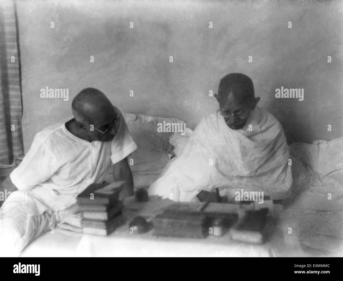 Mahatma Gandhi ; on his day of silence ; writing a note to Chakraborty ...