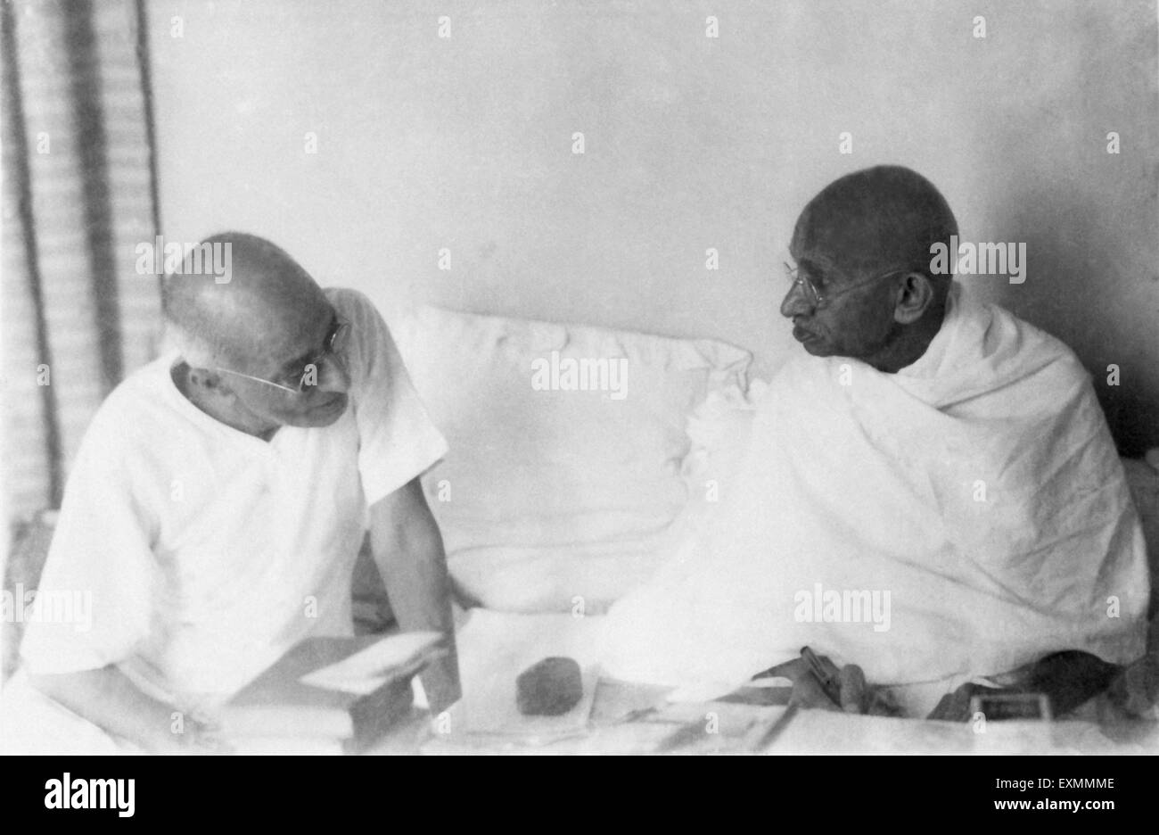 Mahatma Gandhi ; on his day of silence ; writing a note to Chakraborty ...