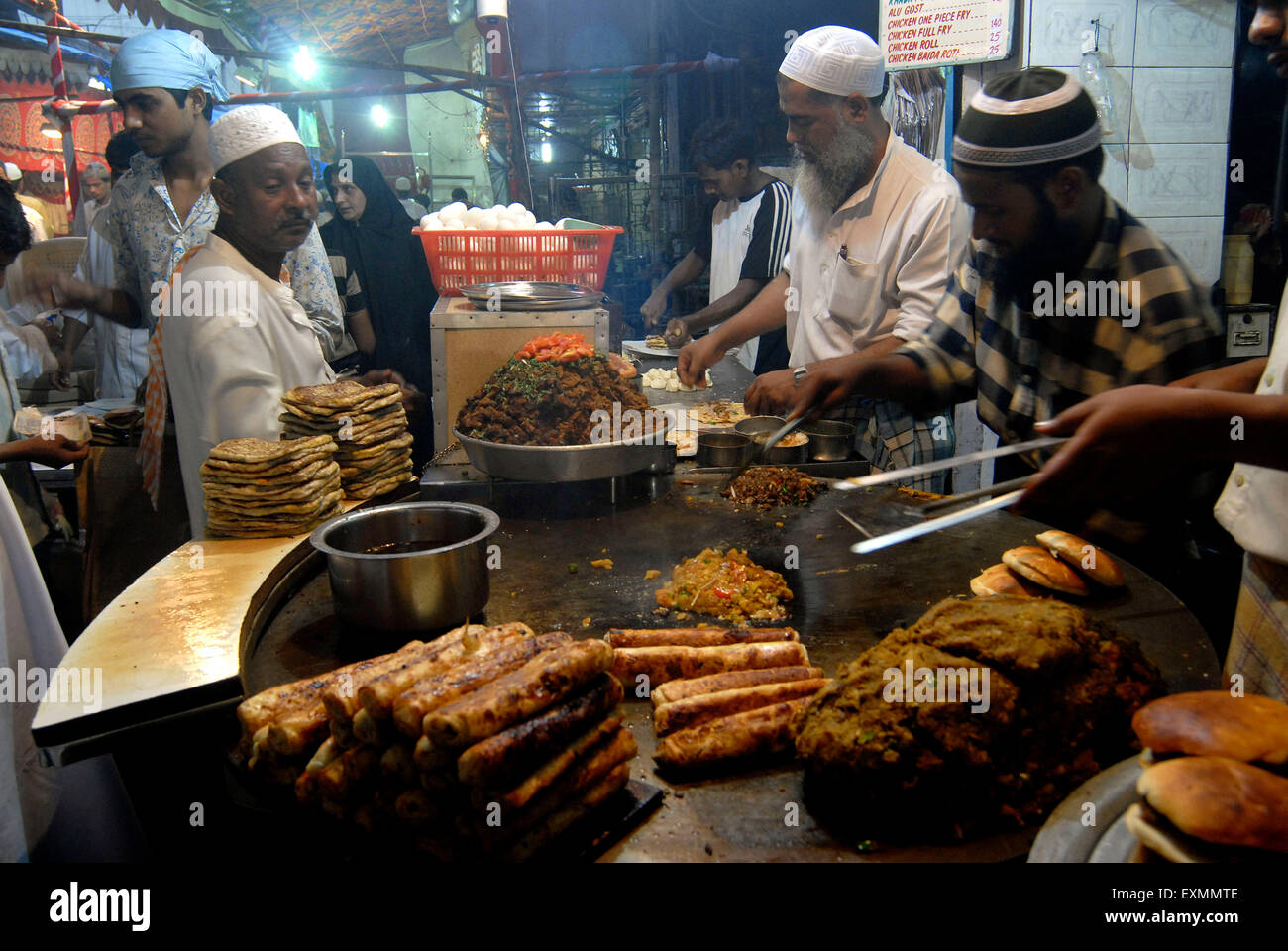 A food vendor prepare eatables as Muslims break their Ramzan or Ramadan ...